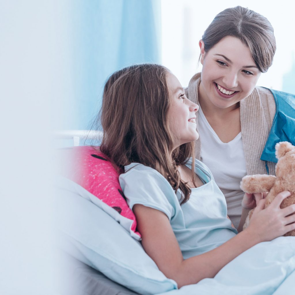 sisters-smiling-in-hospital-PFNWQ8V.jpg – FEMME